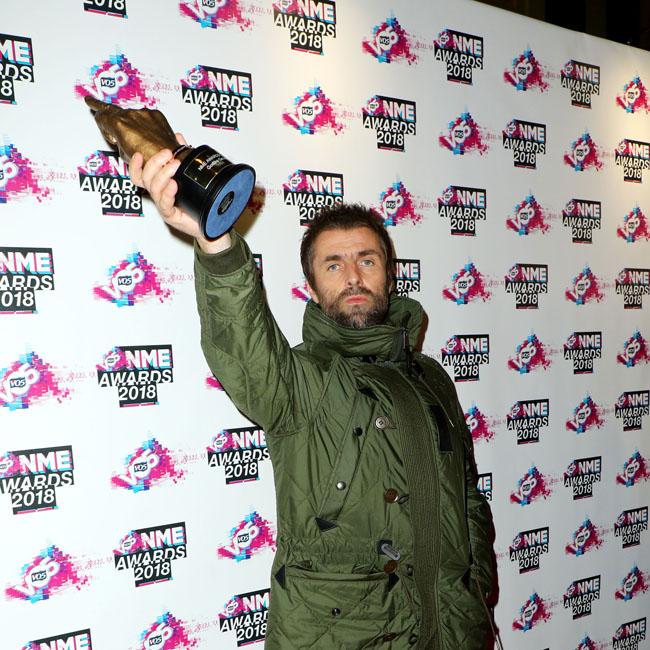 Liam Gallagher hits out at Noel as he's crowned Godlike Genius